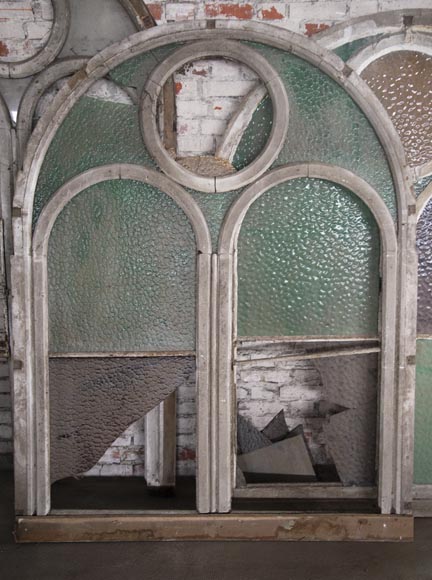 Arched wooden window frames and coloured glass - Monumental and structures