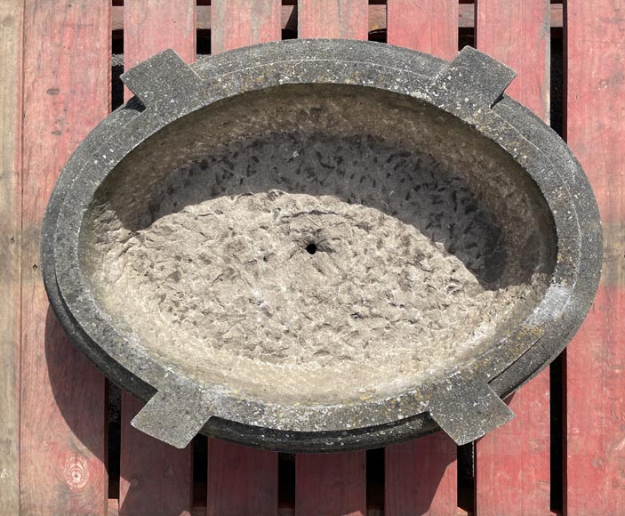 Round stone planter adorned with four projections - Garden ornaments ...