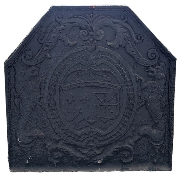 Large fireback with the coat of arms of France and Navarre supported by ...