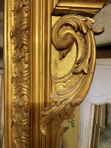 Large gilded trumeau with central medallion in the Napoleon III style ...