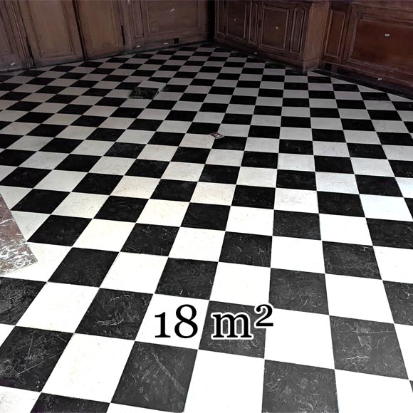 Checkerboard floor in stone and black marble . - Floors
