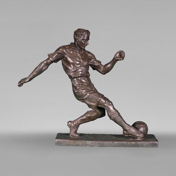 After Raymond TSCHUDIN, “Dribbler”, sculpture of a soccer player in ...