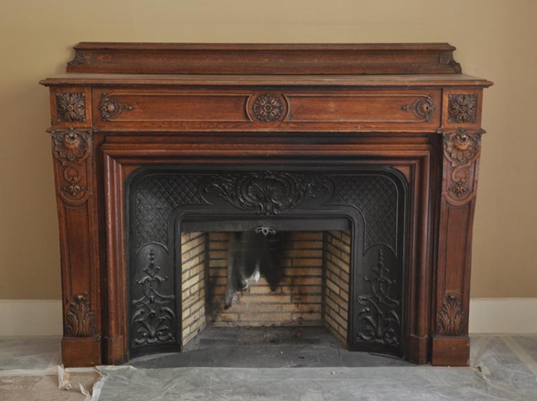 Antique oak wood Louis XVI style fireplace with its cast iron insert - Wood