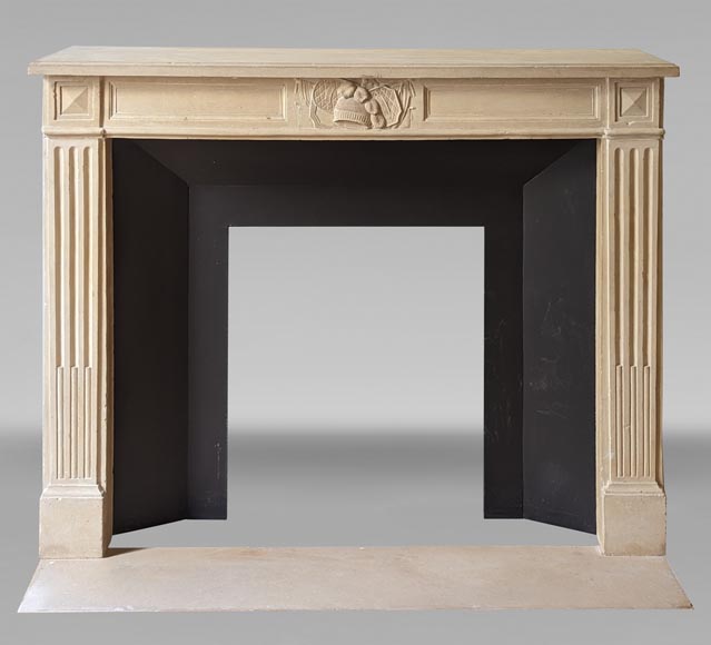 Louis XVI style stone mantelpiece with military trophy - Stone