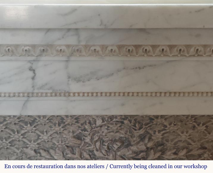 Louis XVI style mantel with pilaster feet carved in veined Carrara ...