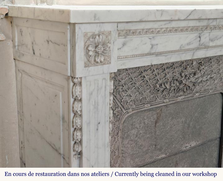 Louis XVI style mantel with pilaster feet carved in veined Carrara ...