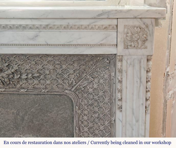 Louis XVI style mantel with pilaster feet carved in veined Carrara ...
